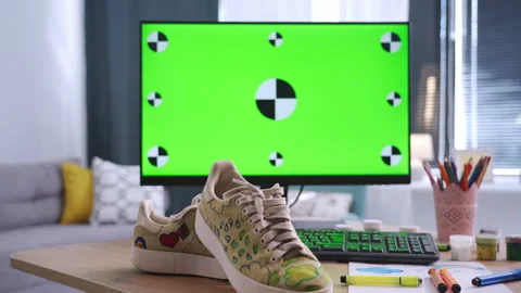 shoes design, a monitor with a green scr... | Stock Video | Pond5