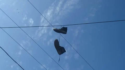 Shoes On Wire Stock Footage ~ Royalty Free Stock Videos | Pond5