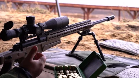 shooting and reloading a sniper rifle | Stock Video | Pond5