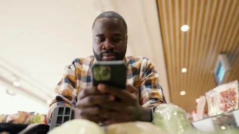 Shooting from below a man with Black ski... | Stock Video | Pond5