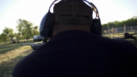 Shooting at a rifle range in high speed. | Stock Video | Pond5