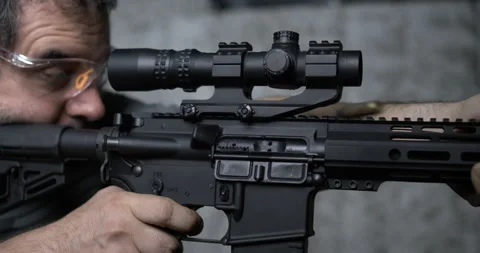 Shooting a single shot with an assault r... | Stock Video | Pond5