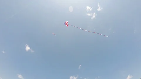 Shot of an american flag kite flying in ... | Stock Video | Pond5