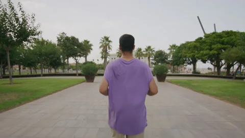 Shot from backwards of teenage caucasian... | Stock Video | Pond5