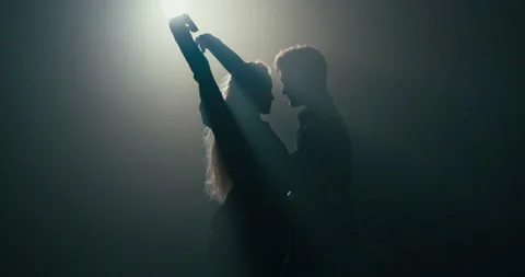 Shot of blurred figures dancing two part... | Stock Video | Pond5