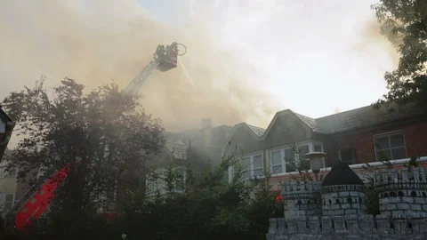 Shot of fire in a roof truss and firefig... | Stock Video | Pond5