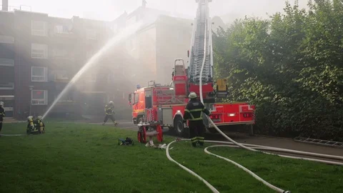 Shot of fire in a roof truss and firefig... | Stock Video | Pond5
