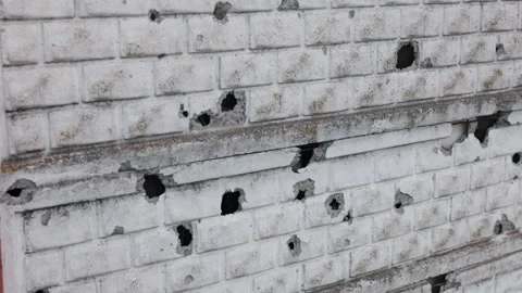 Bullet Hole Concrete Stock Footage ~ Royalty Free Stock Videos | Pond5