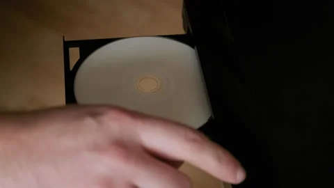 Shot Insert Disc to DVD player. Loading ... | Stock Video | Pond5