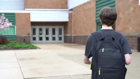 Students Entering School Stock Footage ~ Royalty Free Stock Videos | Pond5