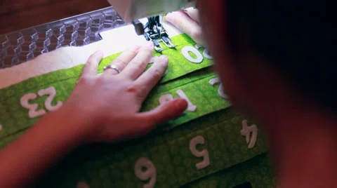 shot of a sewing machine and a advent ca... | Stock Video | Pond5