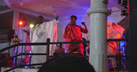 A shot of a singer and his male dancers... | Stock Video | Pond5