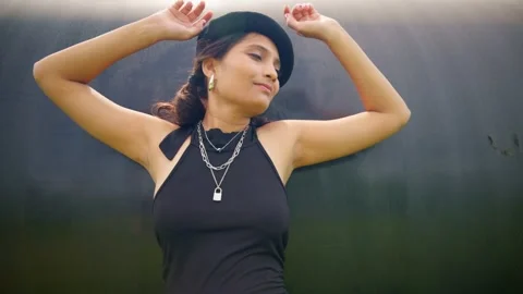 Showcasing Amazing Pose by a Young Model | Stock Video | Pond5