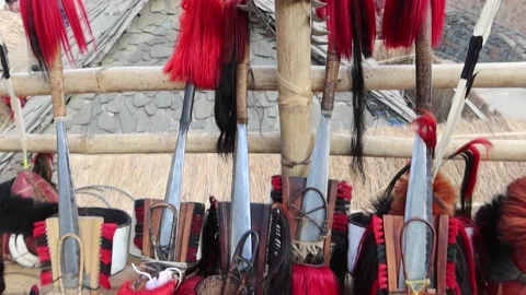 Showcasing traditional tribal weapons at... | Stock Video | Pond5