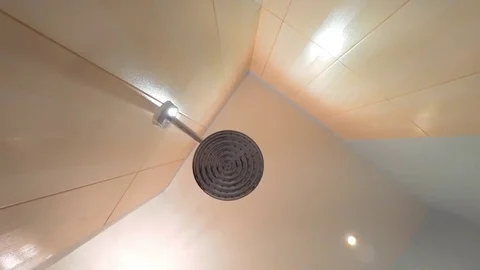 Shower head in bathroom. Falling water d... | Stock Video | Pond5