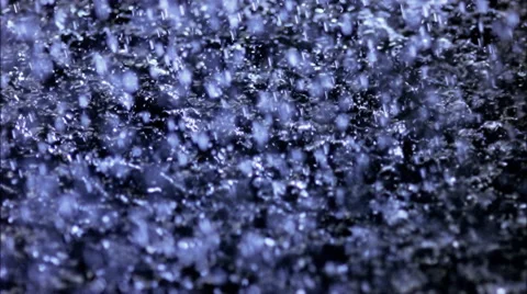 Shower of raindrops splashing on a dark ... | Stock Video | Pond5