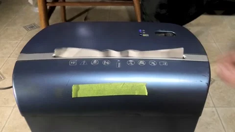 Person Shredding Paper Stock Videos – Royalty-Free HD & 4K Videos