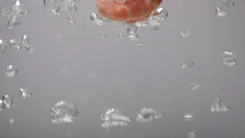 Shrimp falling into boiling water, slow ... | Stock Video | Pond5