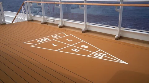 Shuffleboard on teak deck of cruise ship... | Stock Video | Pond5