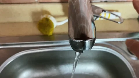 shutting off excess water, making econom... | Stock Video | Pond5