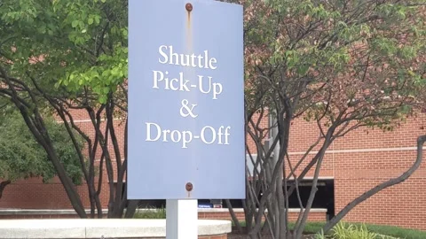 Shuttle Pick-Up & Drop Off Signage | Stock Video | Pond5