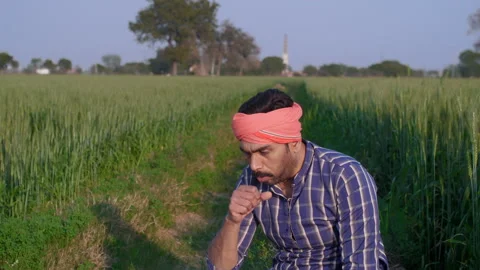 A sick bearded farmer in traditional clo... | Stock Video | Pond5