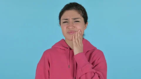 Sick Indian Girl having Toothache, Blue ... | Stock Video | Pond5