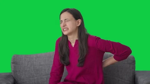 Sick Indian woman suffering from back pa... | Stock Video | Pond5