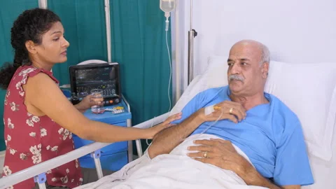 Sick old man coughing in the hospital be... | Stock Video | Pond5