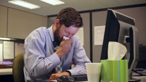 A sick young Caucasian man working in hi... | Stock Video | Pond5