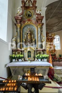 Side altar with figure of Mary and sacrificial candles St Verena parish ...