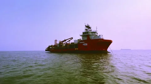 A side angle shot of a ship anchored in ... | Stock Video | Pond5