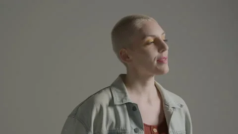 Side Profile Shot of Model Posing Off-Ca... | Stock Video | Pond5