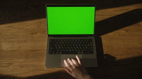 Side Scroll on Green Screen Laptop Touch... | Stock Video | Pond5