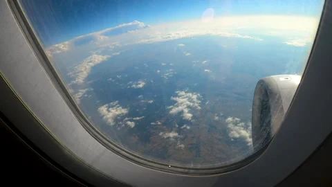 Side view from an aeroplane window, clou... | Stock Video | Pond5