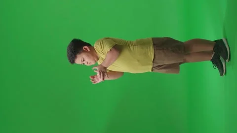 Side View Of Asian Little Boy Clapping H... | Stock Video | Pond5