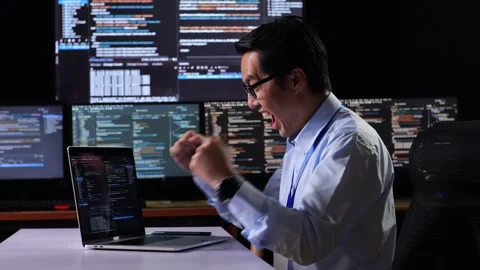 Side View Of Asian Male Programmer Celeb... | Stock Video | Pond5