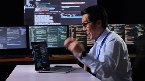 Side View Of Asian Male Programmer Celeb... | Stock Video | Pond5