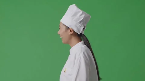 Side View Of Asian Woman Chef Walking An... | Stock Video | Pond5