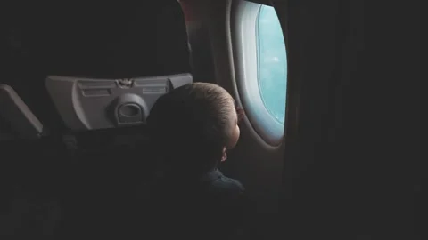 Side view from back seat, child looks ou... | Stock Video | Pond5