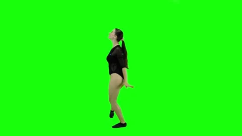 Side view of a beautiful model dancing i... | Stock Video | Pond5