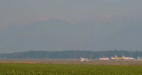 Side view of Bombardier CRJ-900 landing | Stock Video | Pond5
