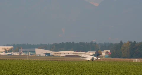 Side view of Bombardier CRJ-900 landing | Stock Video | Pond5