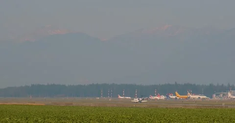 Side view of Bombardier CRJ-900 landing | Stock Video | Pond5