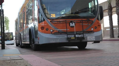 Side view of the bus driving by LA Union... | Stock Video | Pond5