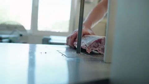 Side View Of Butcher Using Meat Band Saw... | Stock Video | Pond5