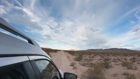 Side view of a car driving offroad throu... | Stock Video | Pond5