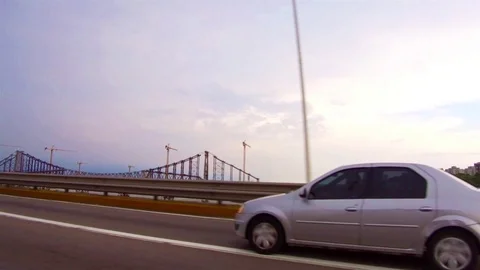 Side view from a car driving over a brid... | Stock Video | Pond5