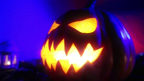 Side view of a carved scary evil-smiling... | Stock Video | Pond5