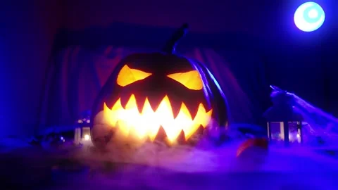 Side view of a carved scary evil-smiling... | Stock Video | Pond5